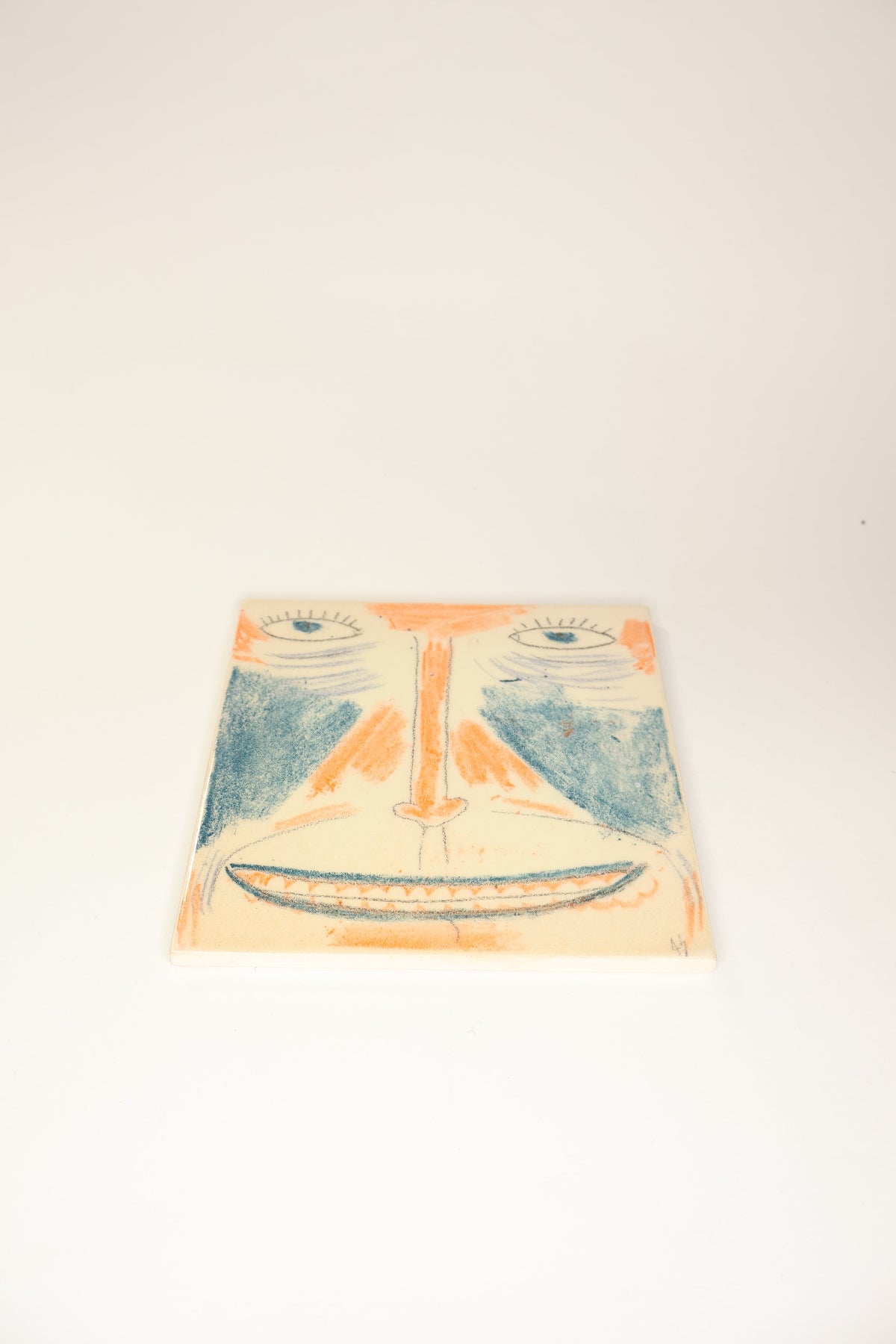 Face tile – Kintu Studio